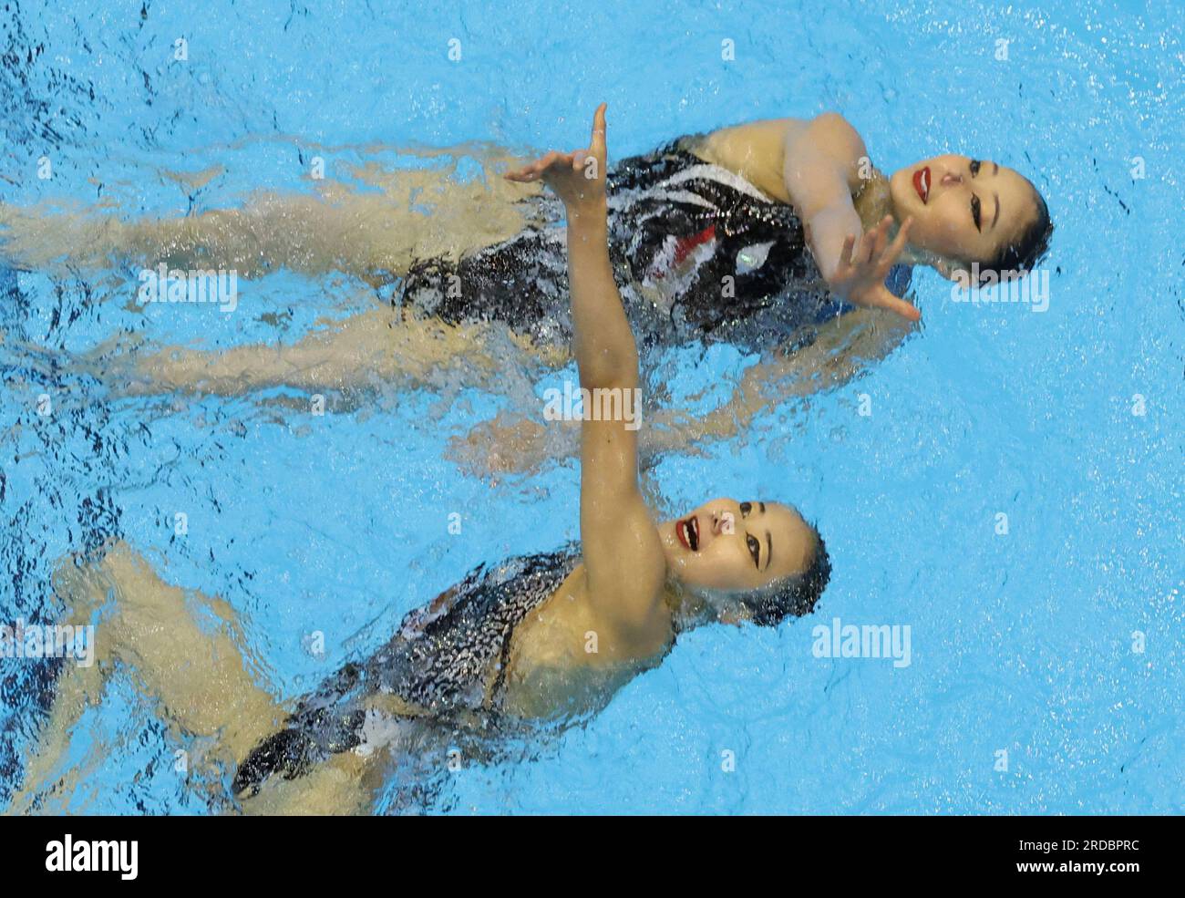 Moe HIGA and Mashiro YASUNAGA of Japan perform during the Artistic ...