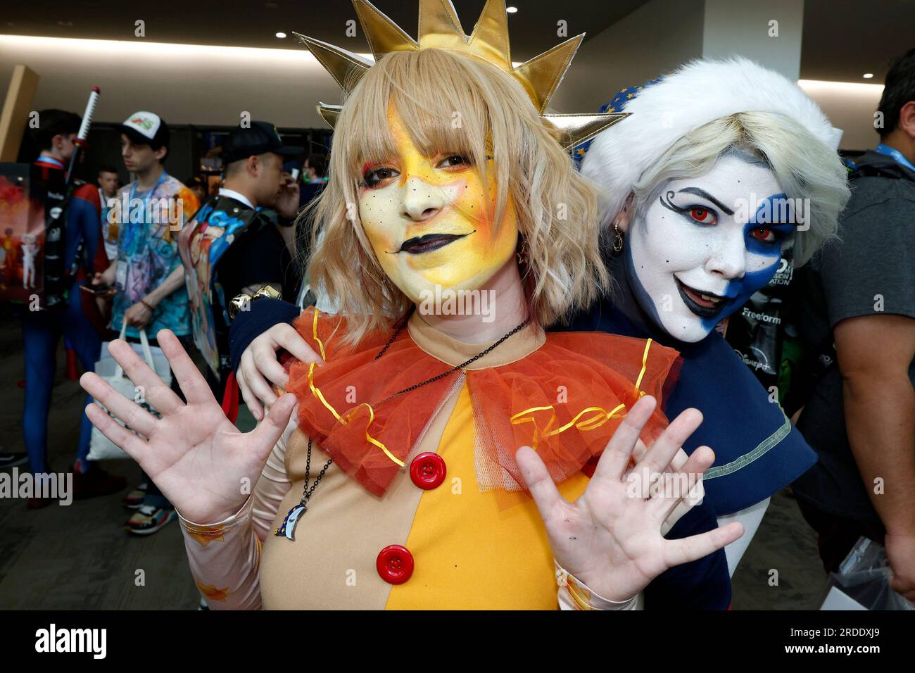 San Diego residents Cassandra Zimmerman, dressed as Sundrop, left, and ...