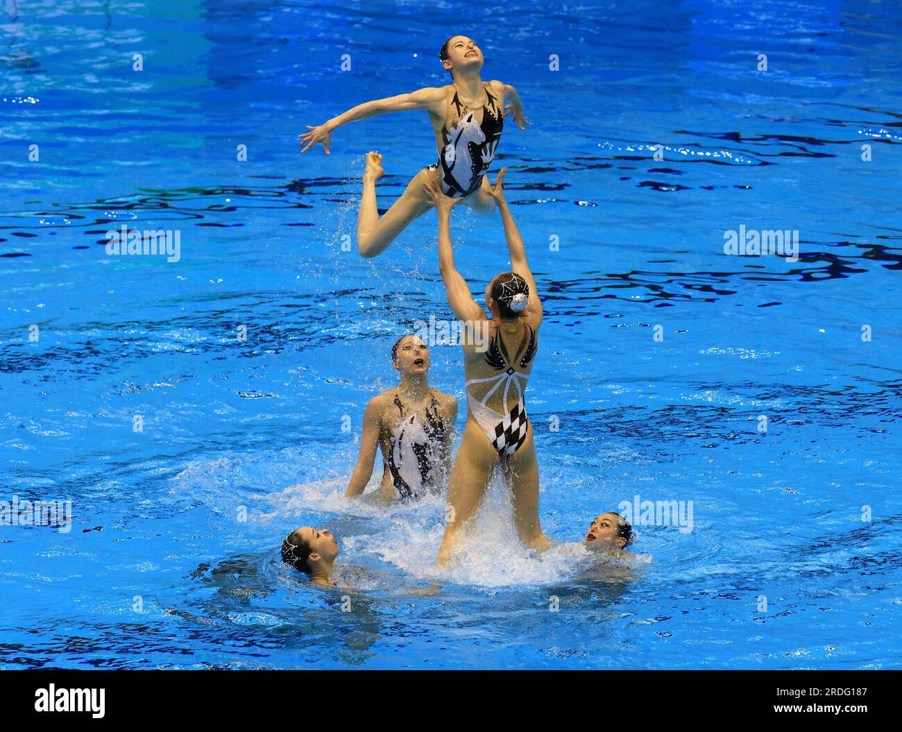 Japanese team members perform during the Artistic Swimming Team Free ...