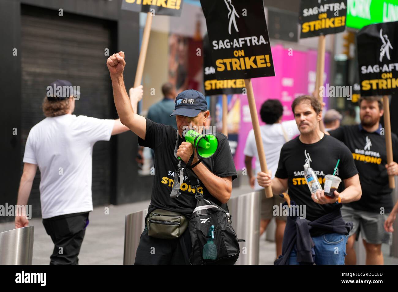 Picketers carry signs outside Paramount in Times Square on Friday, July ...