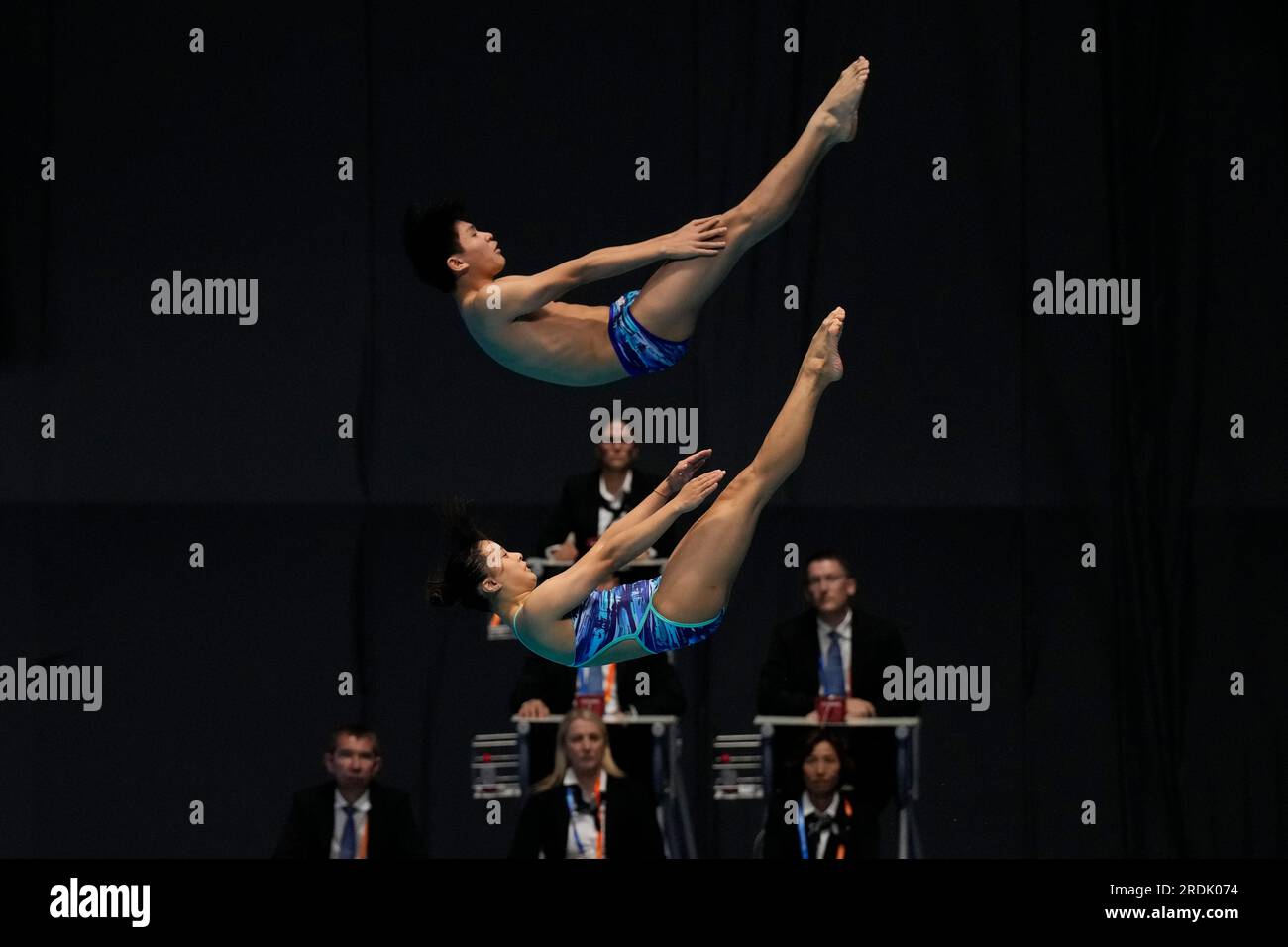 Choi Sut Kuan and He Heung Wing of Macao compete in the mixed diving 3m ...