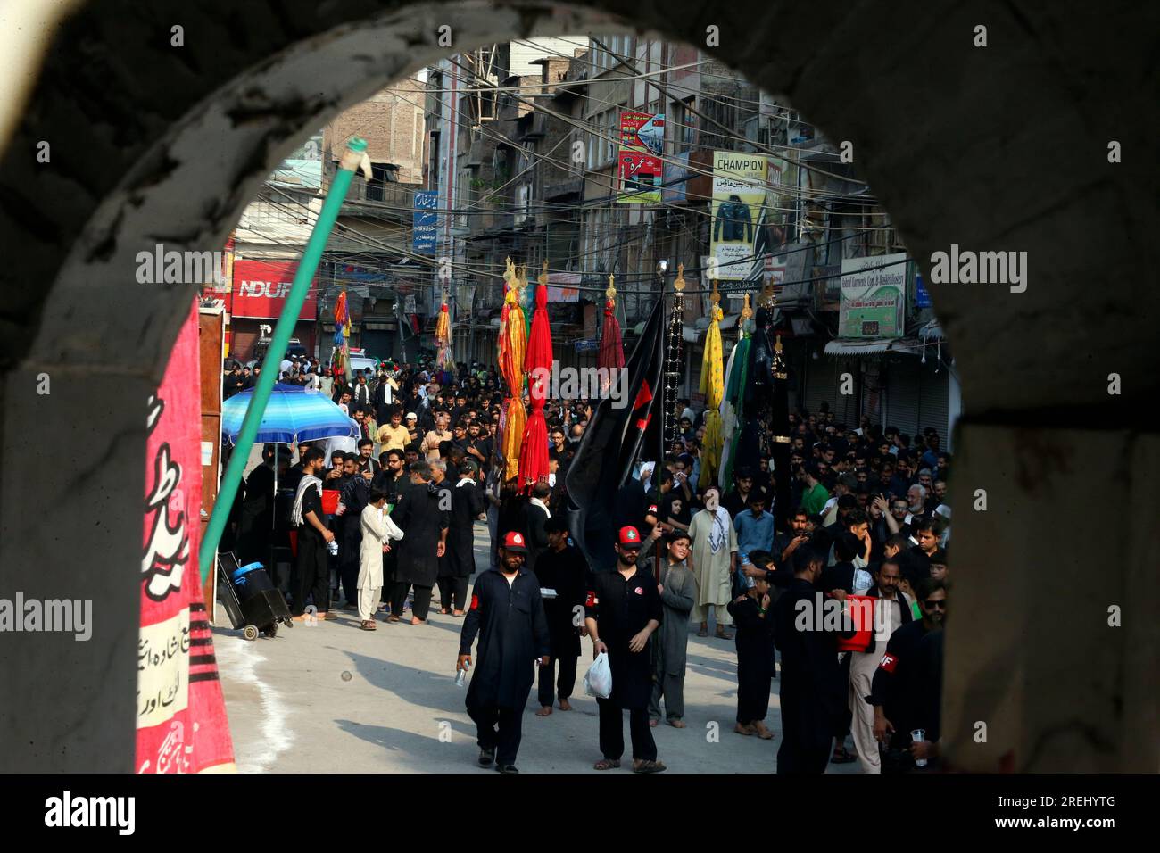 People participate in the Ashoura procession in Peshawar, Pakistan ...