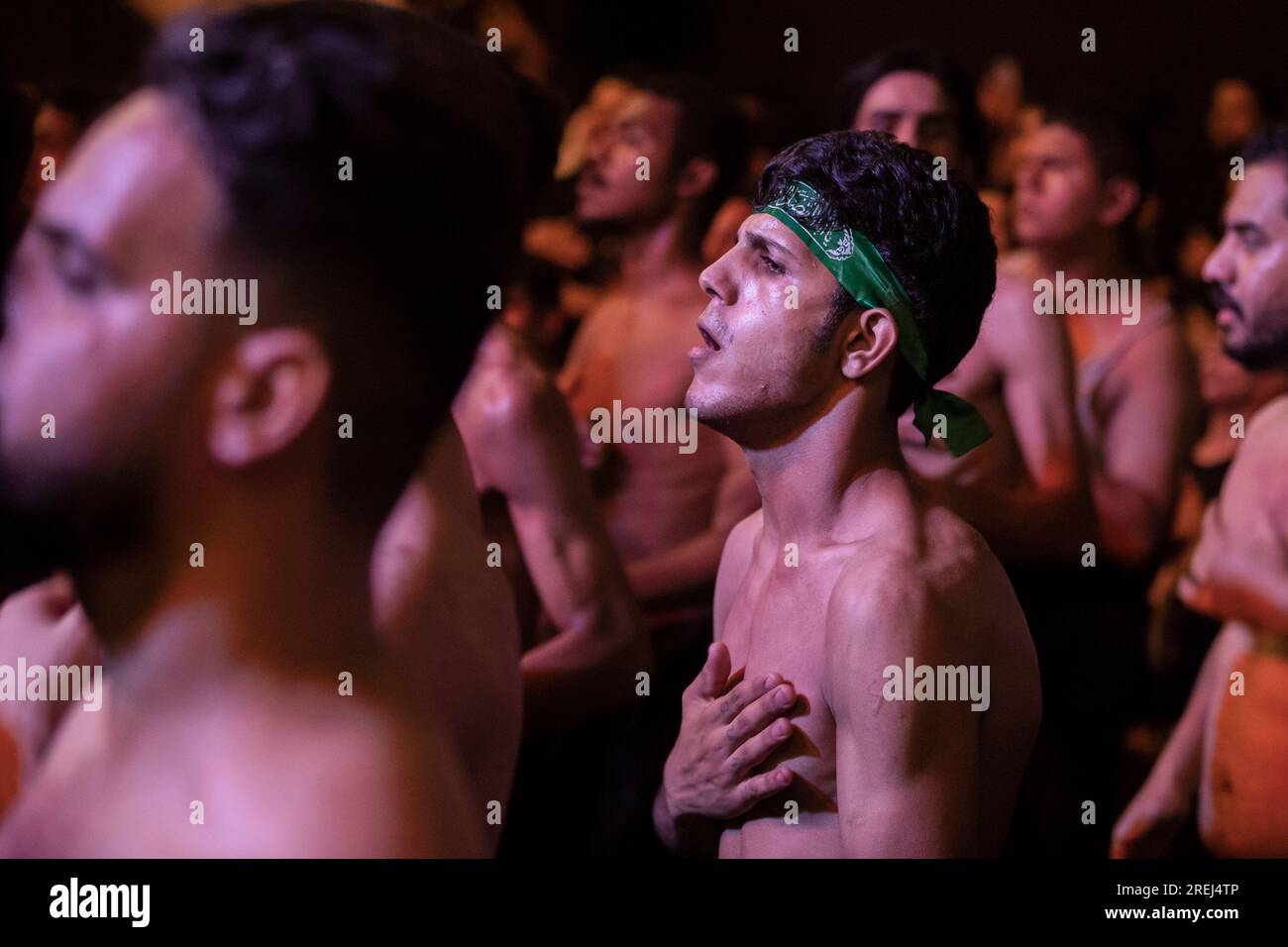 Shiite faithful Muslims beat their chests as a sign of grief for Imam ...