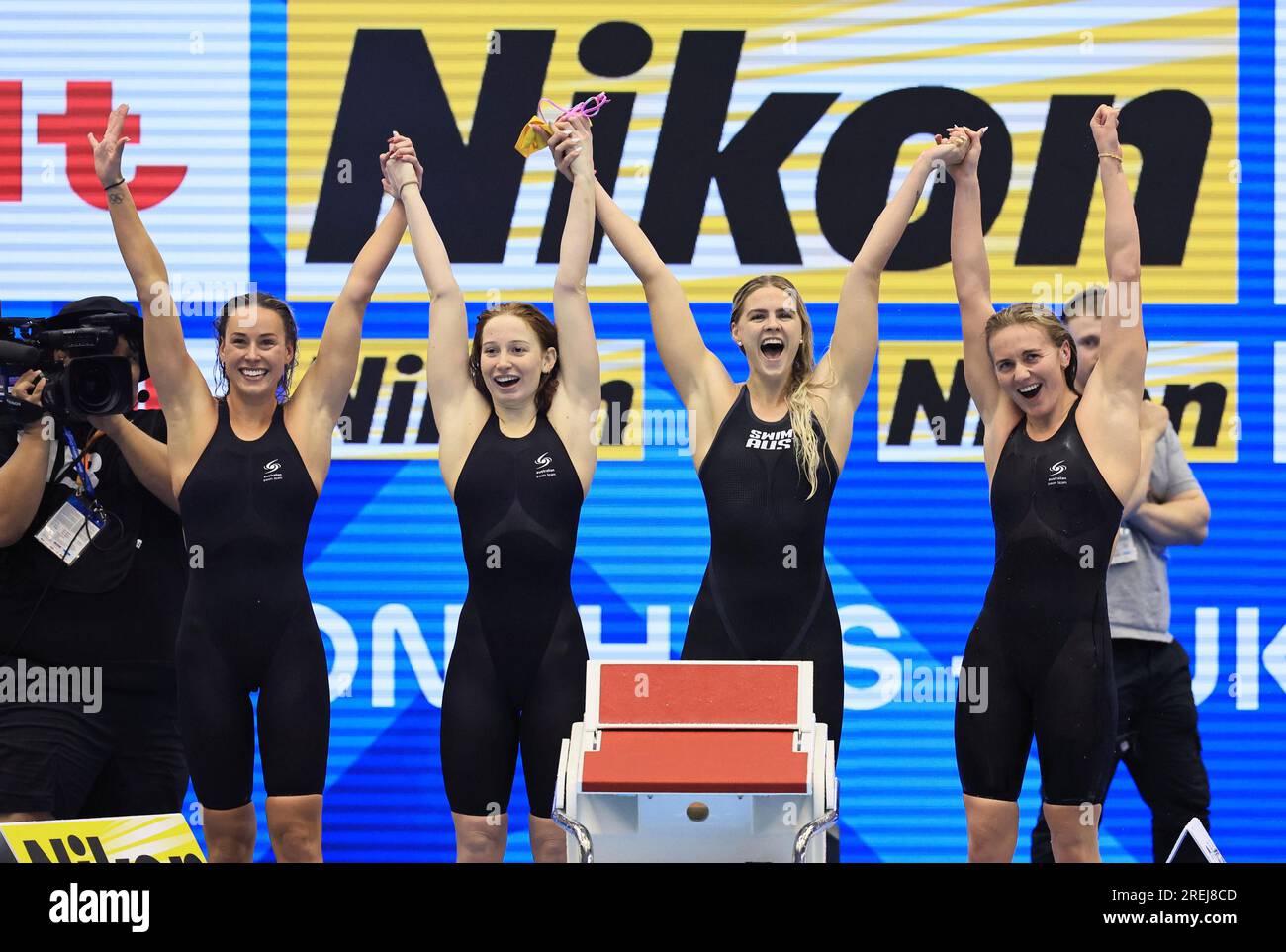 Members of Australia react during women's 4x200m freestyle relay final of World Aquatics ...
