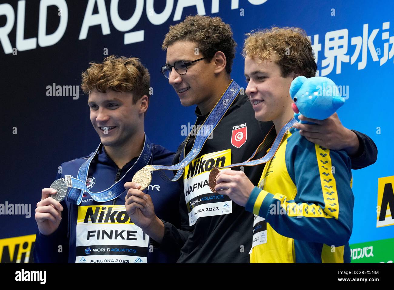 Medalists, from left to right, Bobby Finke of the U.S., silver, Tunisia ...