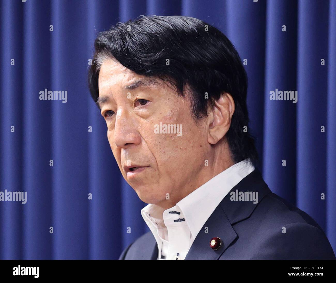 Japan's Justice Minister Ken Saito attends a press conference to ...