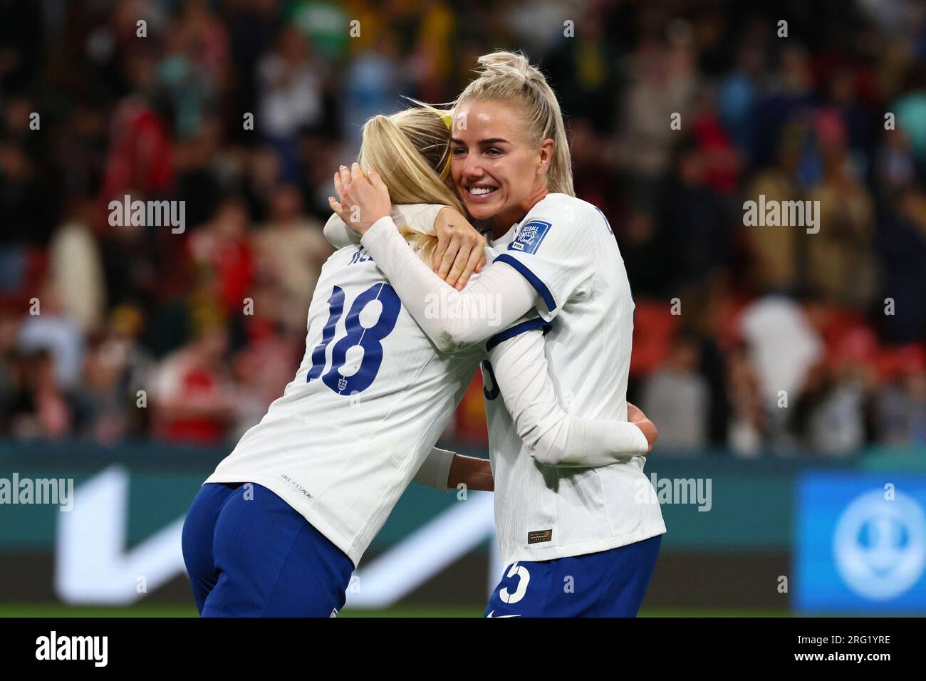 England's Chloe Kelly, left, celebrates with England's Alex Greenwood ...