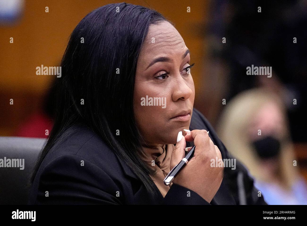 FILE - Fulton County District Attorney Fani Willis watches proceedings ...