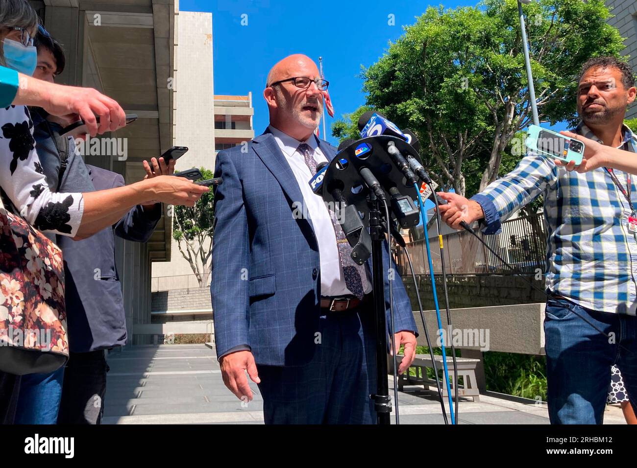 Larry Rosen, the brother of Sheryl Ferguson, speaks with reporters ...