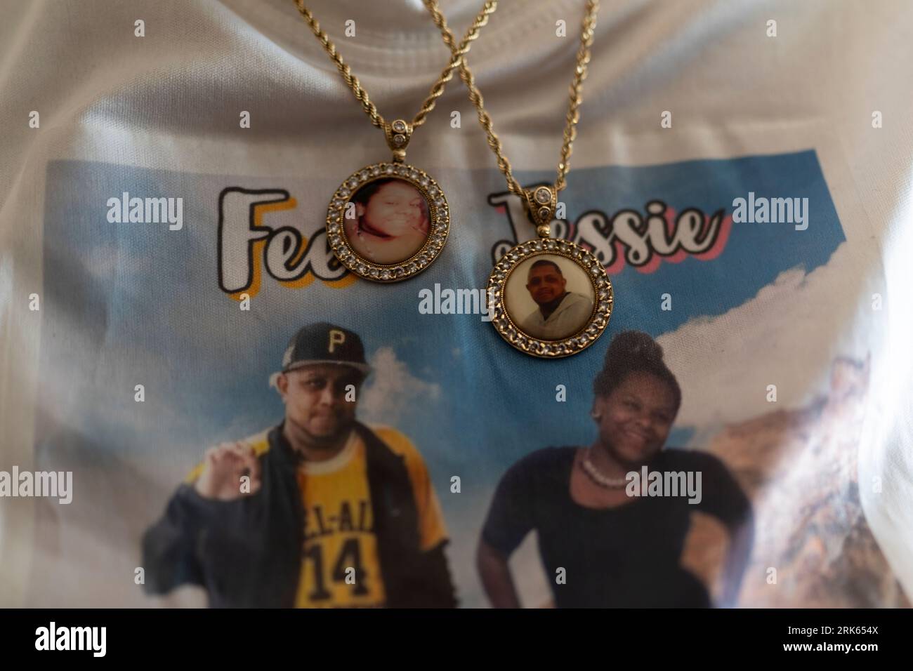 Charlene Roberts wears necklaces with portraits of her children lost to ...