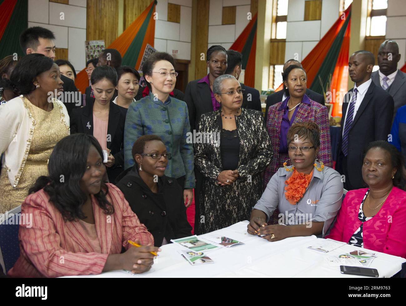 Cheng Hong (3rd L, front), wife of Chinese Premier Li Keqiang, visits a ...