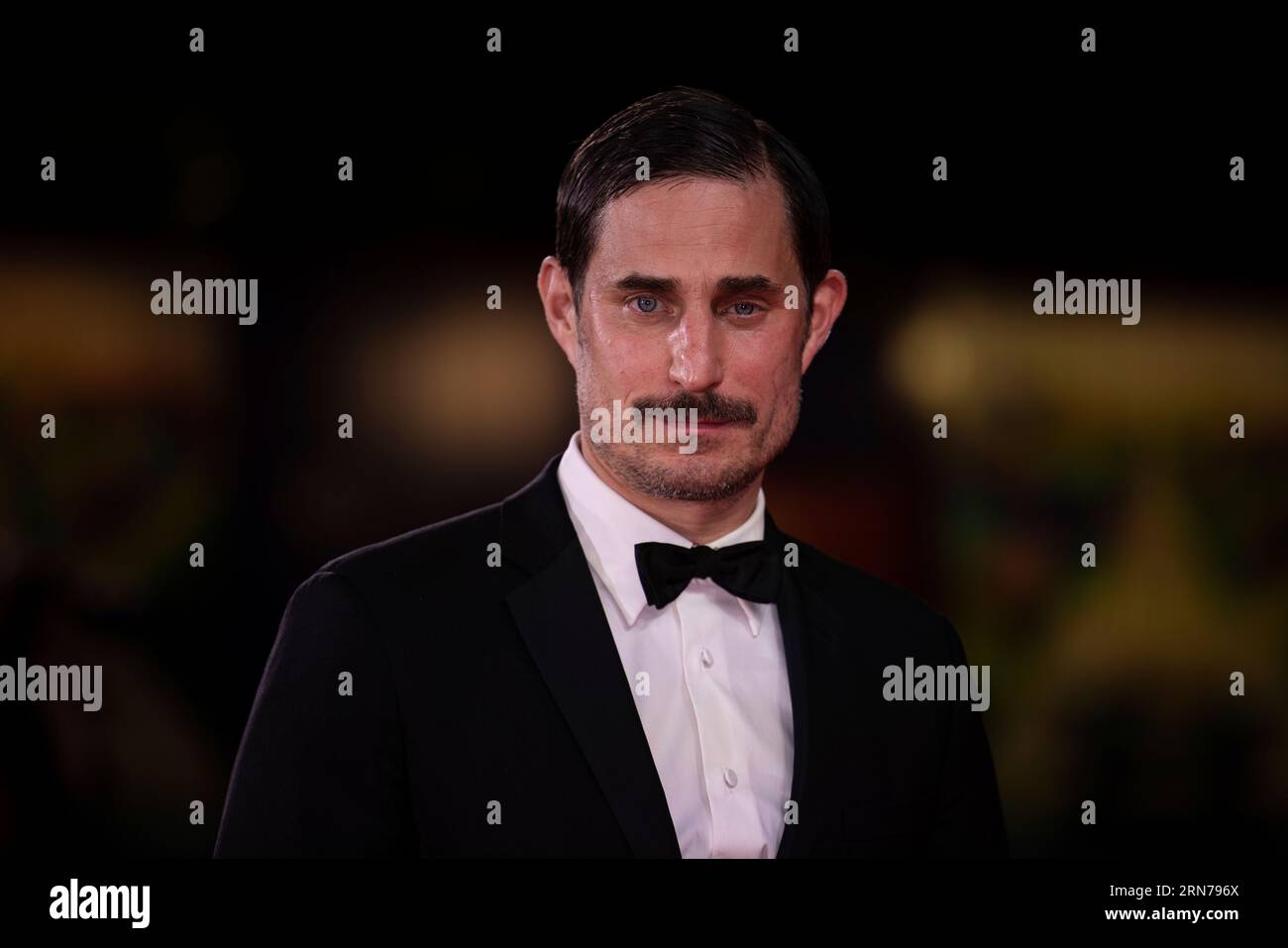 Clemens Schick poses for photographers upon arrival for the premiere of ...