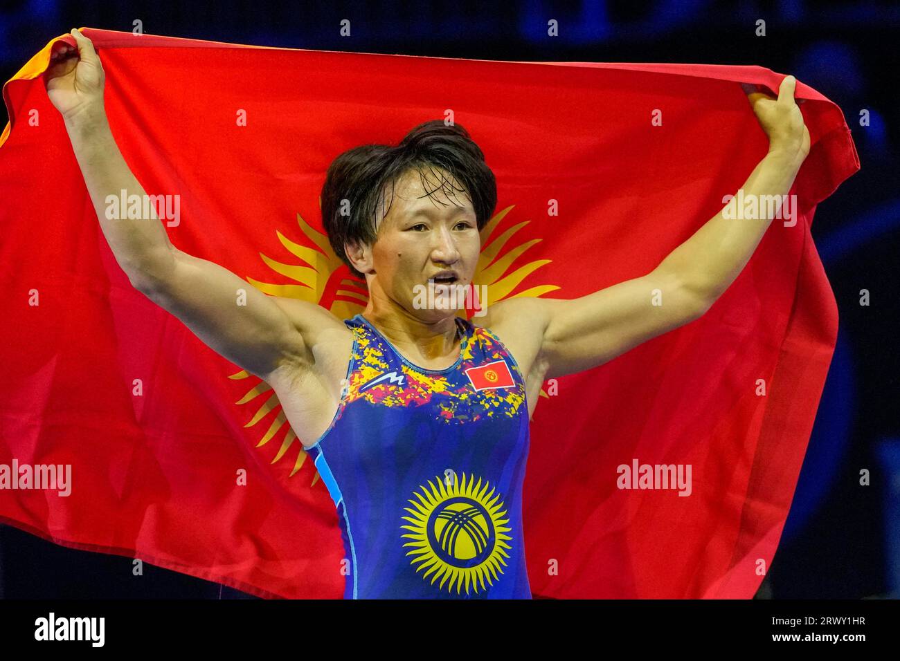 Kyrgyz Aisuluu Tynybekova celebrates defeating Sakura Motoki of Japan ...
