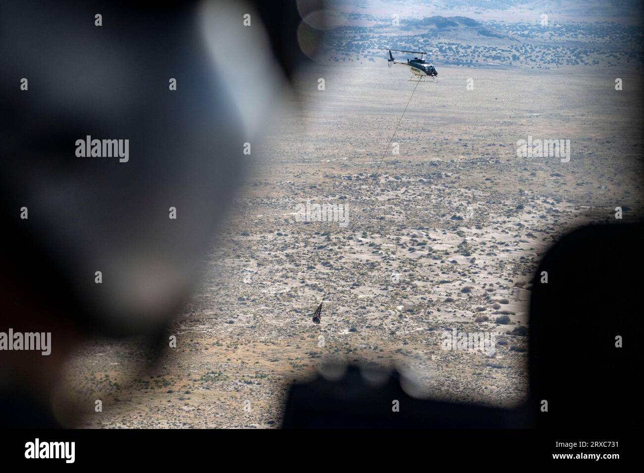 In this photo provided by NASA, the sample return capsule from NASA's ...