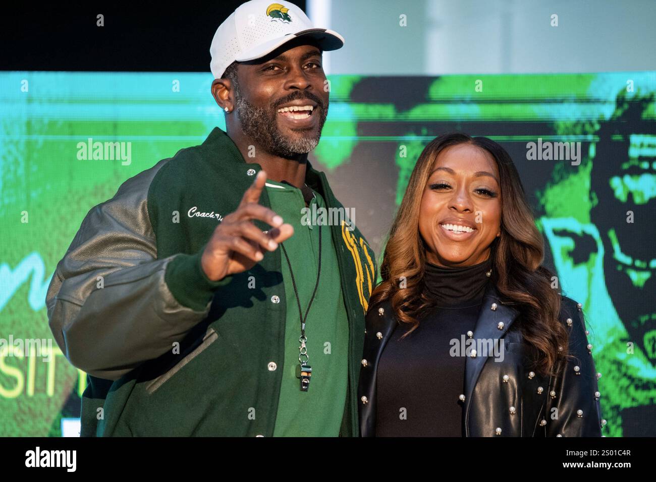 Michael Vick and his wife Kijafa Vick pose for a photo after he was ...