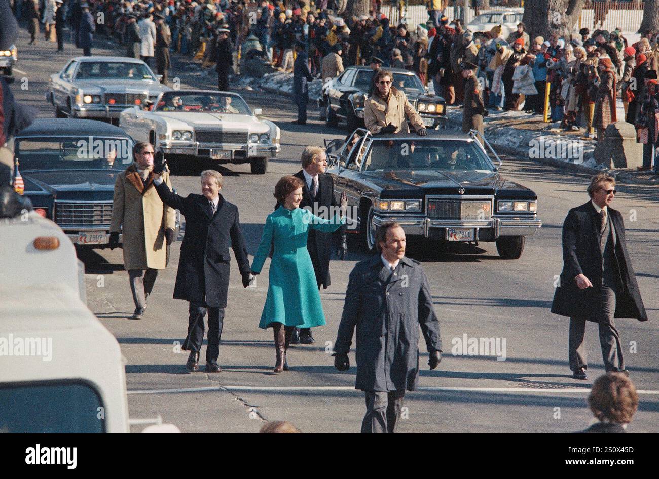 FILE - President Jimmy Carter and first lady Rosalynn Carter walk down ...