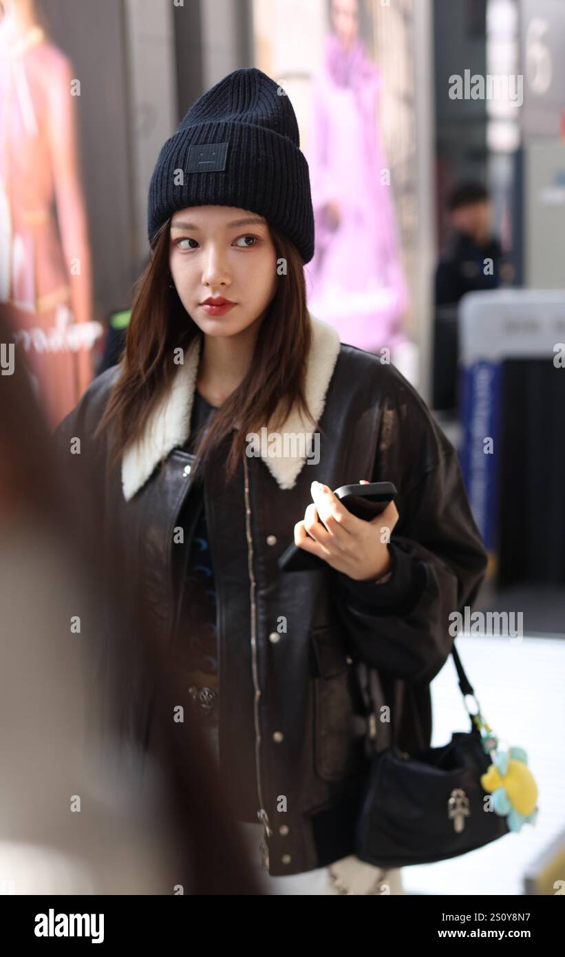 Chinese singer, dancer and actress Cheng Xiao appears at the airport in ...