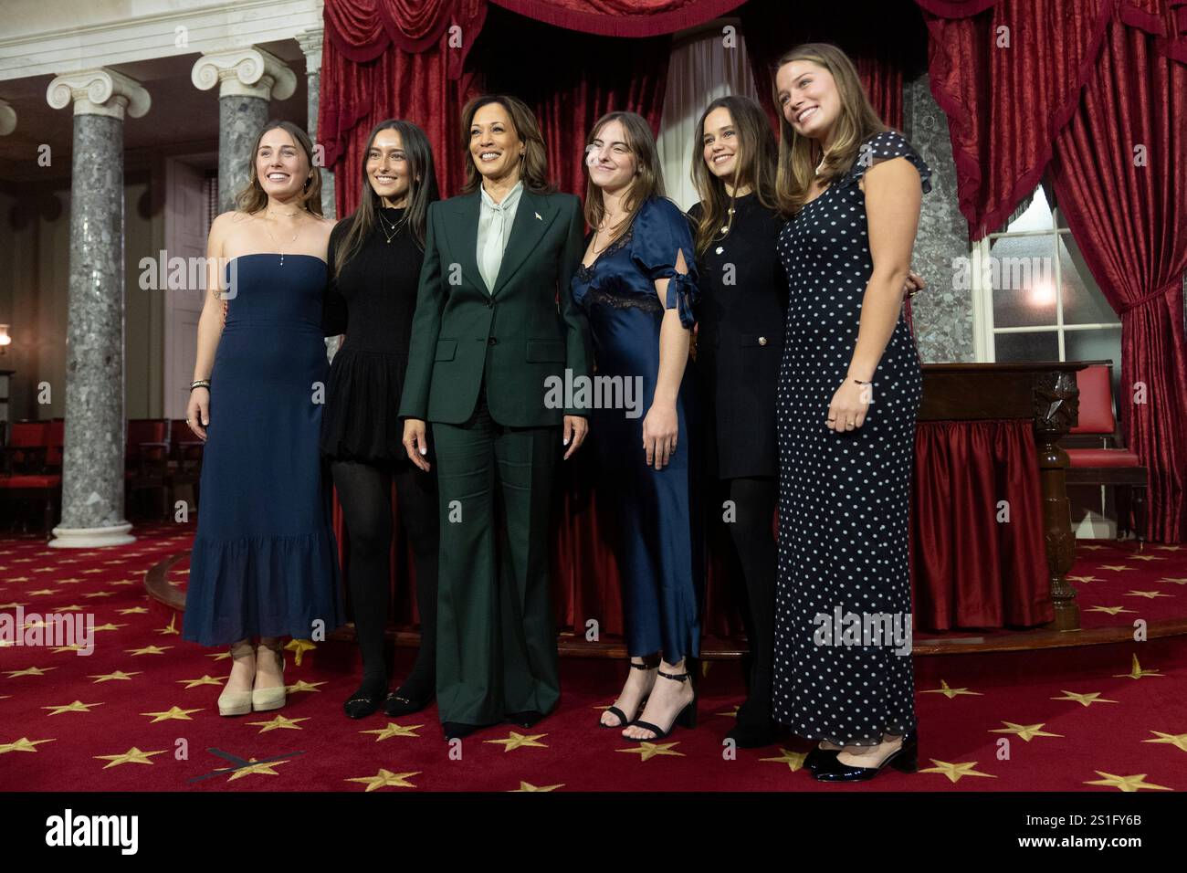 Vice President Kamala Harris, third from left, poses for a picture with ...