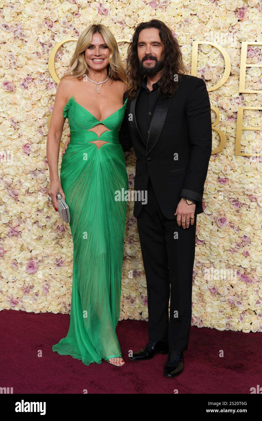 Heidi Klum, left, and Tom Kaulitz arrive at the 82nd Golden Globes on ...
