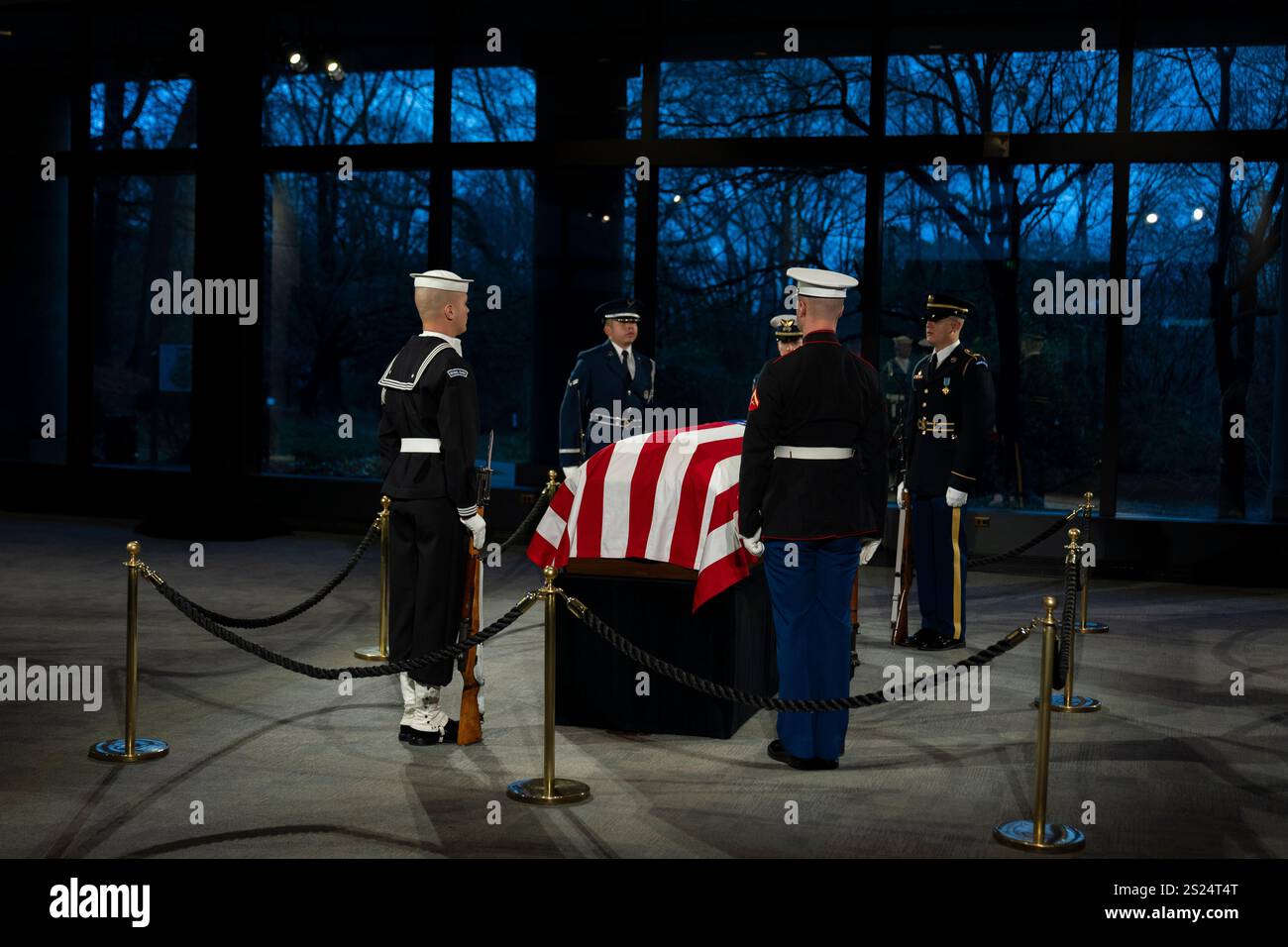 Mourners view the casket of former President Jimmy Carter as he lies in repose at the Jimmy ...