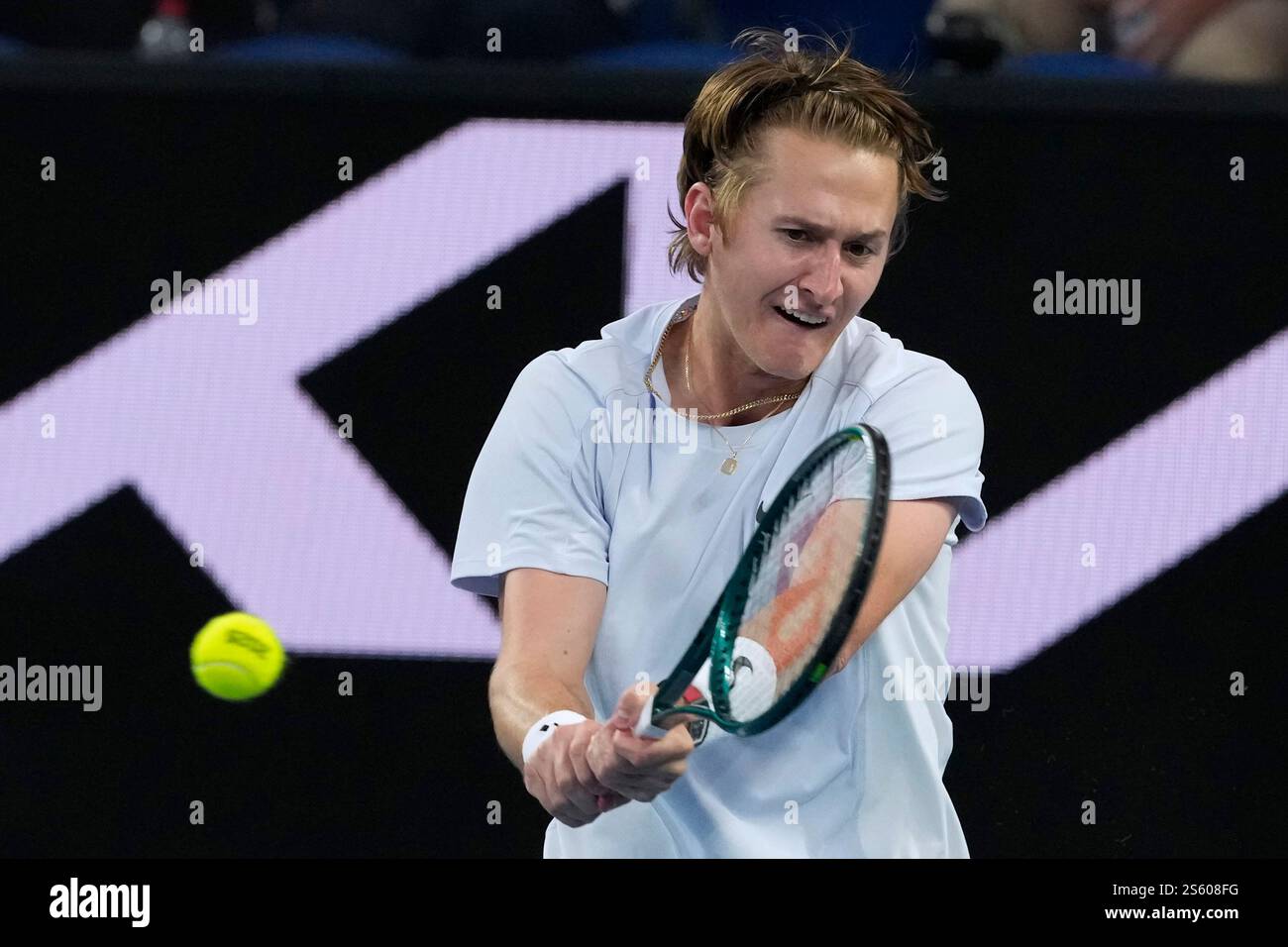 Sebastian Korda of the U.S. plays a backhand return to Aleksandar Vukic of Australia during ...