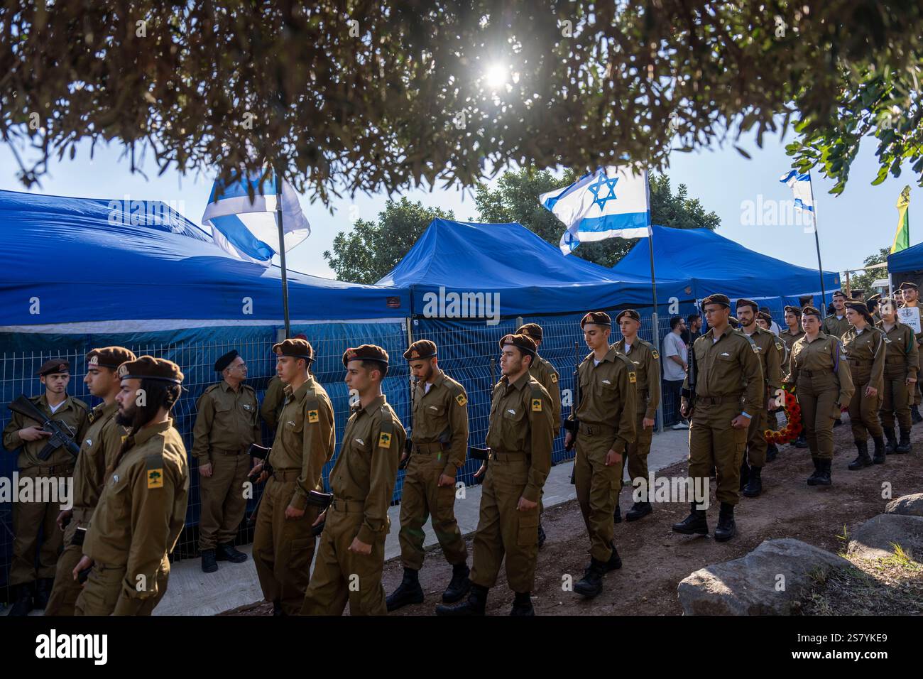 Israeli soldiers attend the funeral of soldier Oron Shaul, who was ...