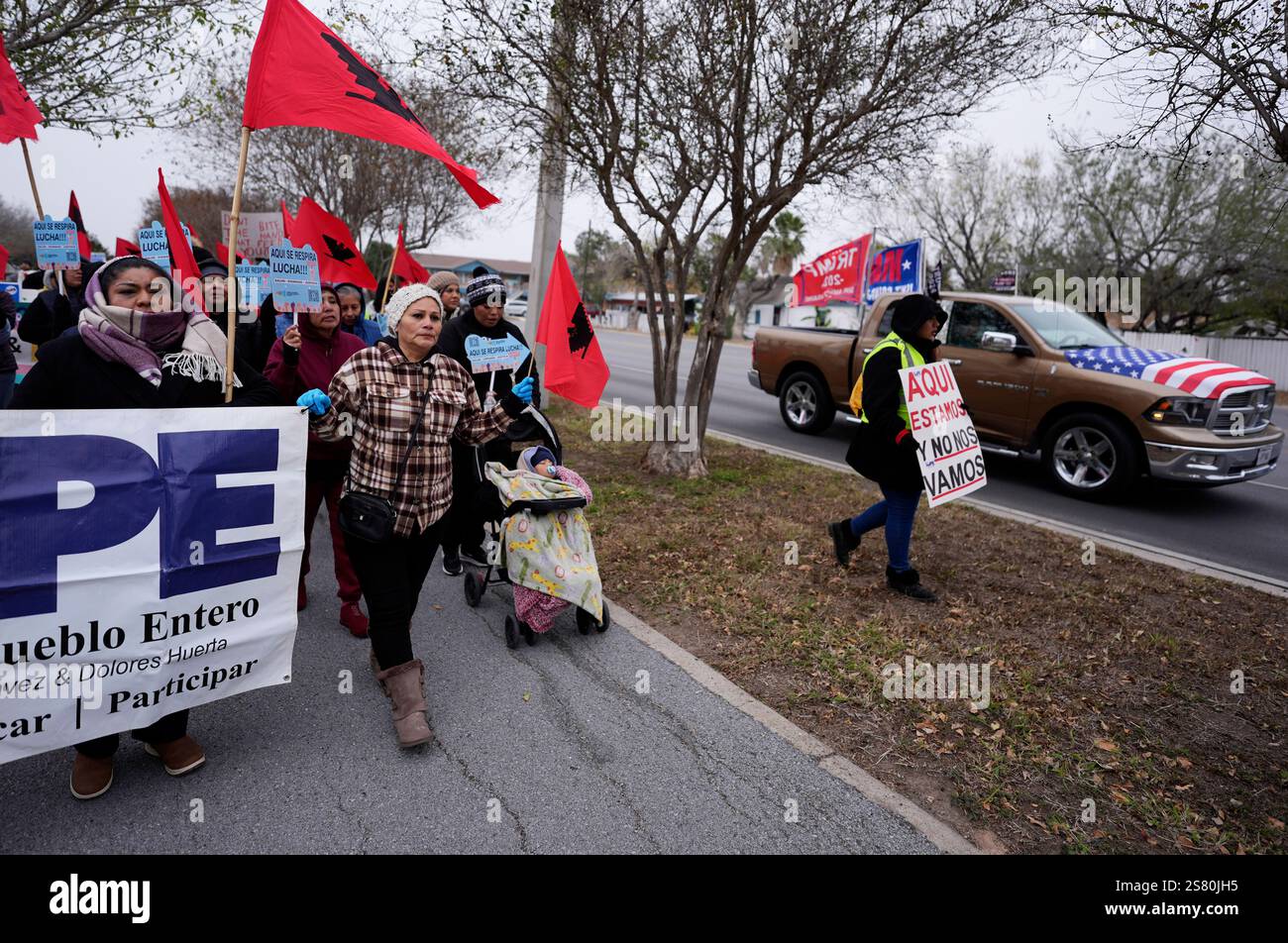 Supporters of President-elect Donald Trump honk as they past a group ...