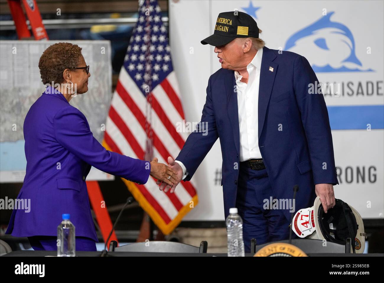 President Donald Trump shakes hands with Los Angeles Mayor Karen Bass ...