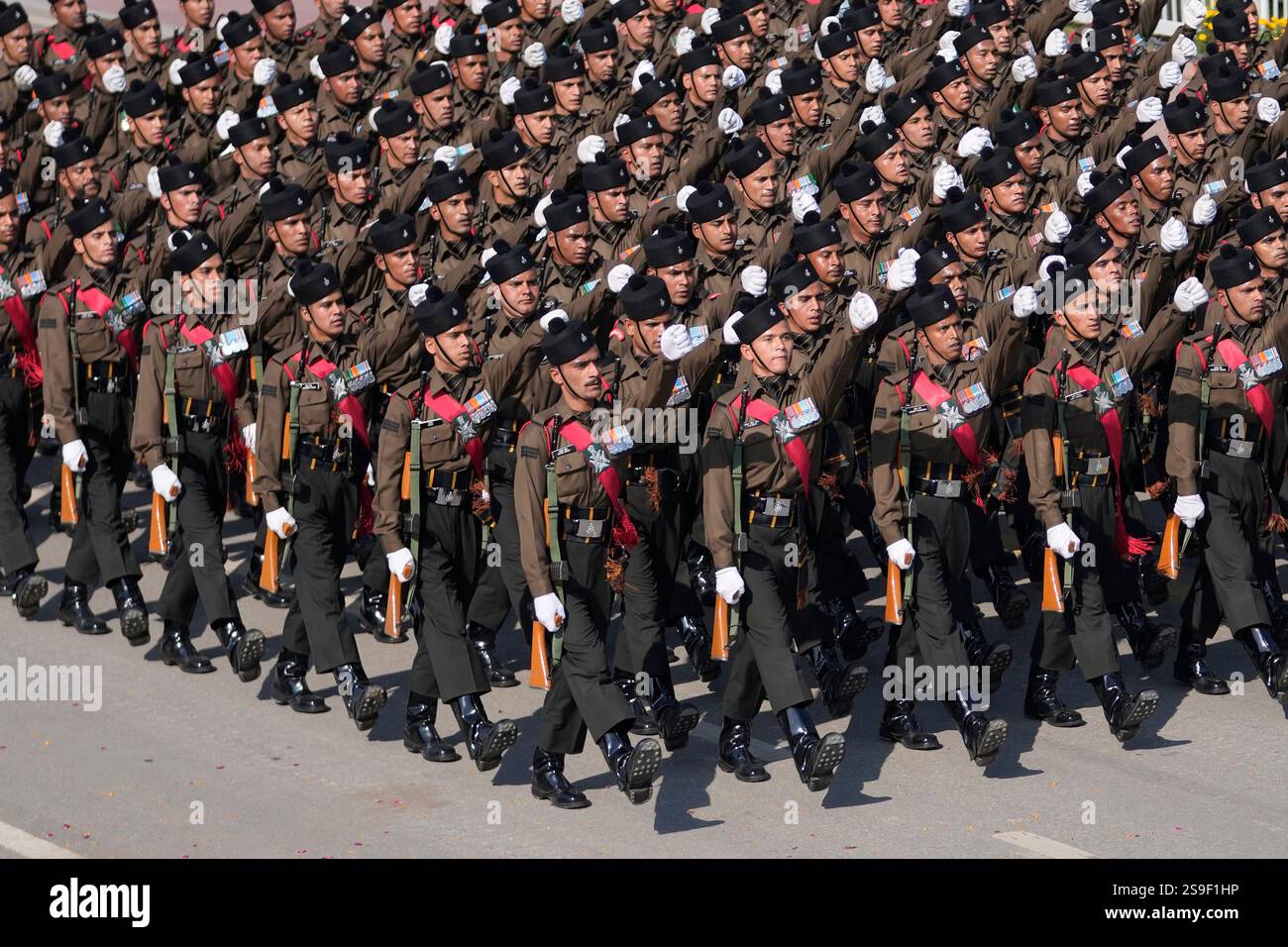 Indian defense forces march through the ceremonial Kartavya Path ...