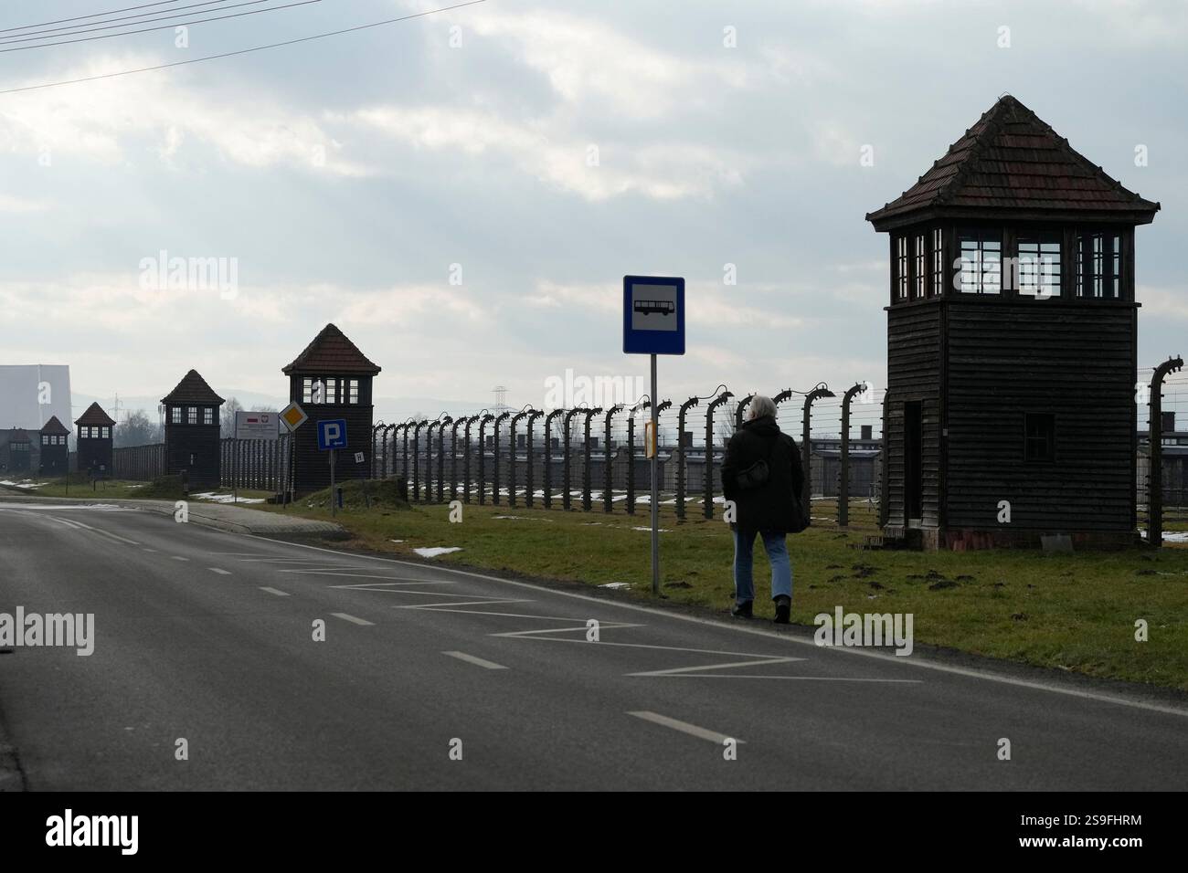 A man walks outside the former Nazi German concentration and ...