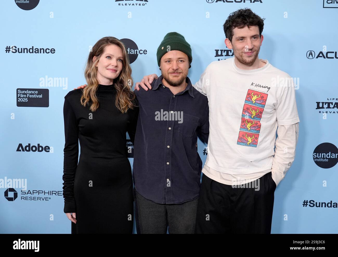 Max Walker-Silverman, center, writer/director of "Rebuilding," poses ...