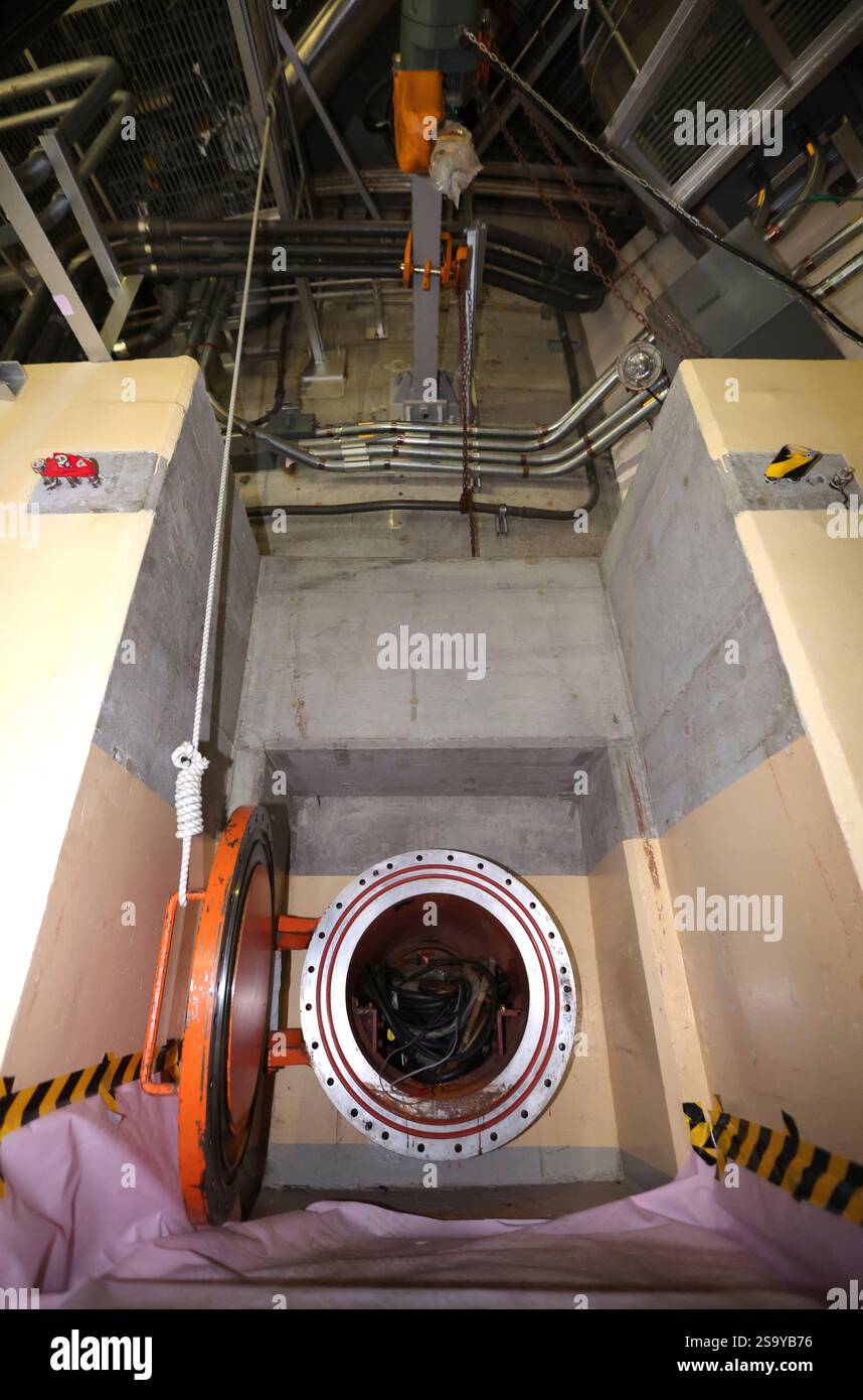 A photo shows X-6 Penetration, a work hole opened in the containment ...