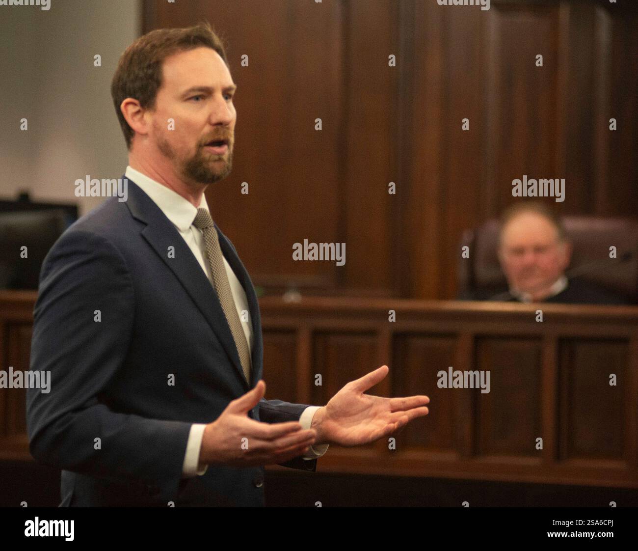 Prosecutor John Fowler makes his opening statement to the jury Tuesday ...