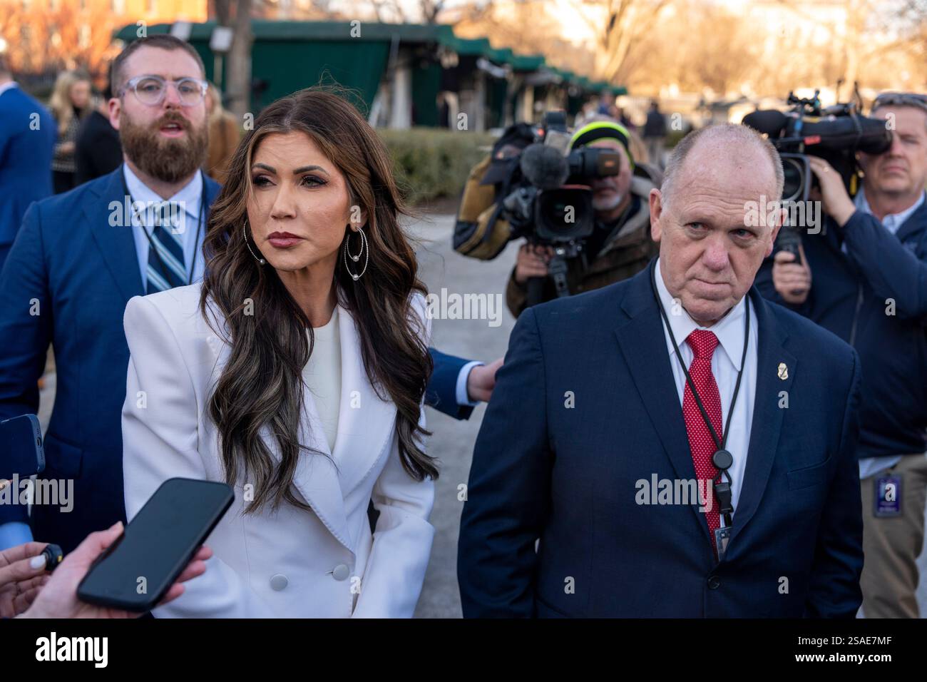 Homeland Security Secretary Kristi Noem, left, and White House border czar Tom Homan speak with ...