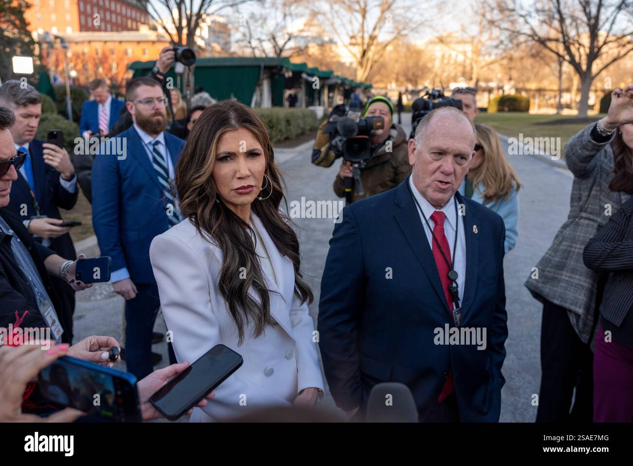 Homeland Security Secretary Kristi Noem, left, and White House border czar Tom Homan speak with ...
