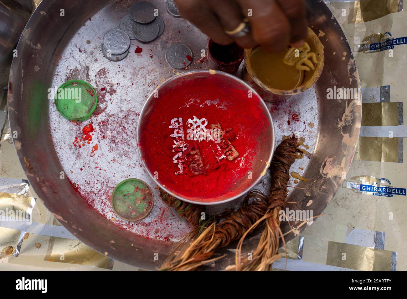 Tools for sacred marks, sandalwood paste, vermillion powder and metal ...