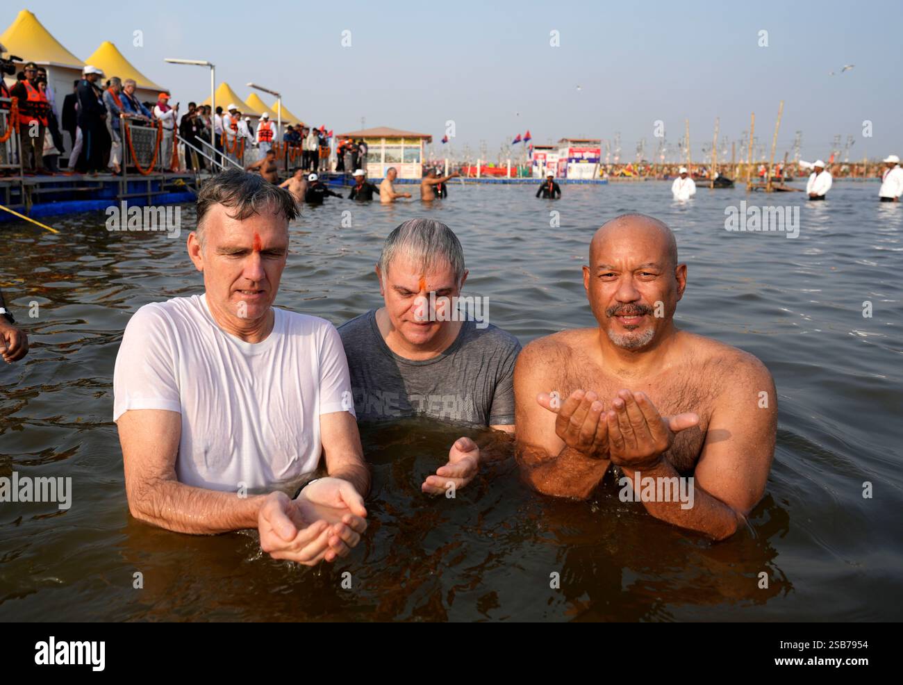 Delegation of diplomats and foreign guests take holy dip at sangam ...