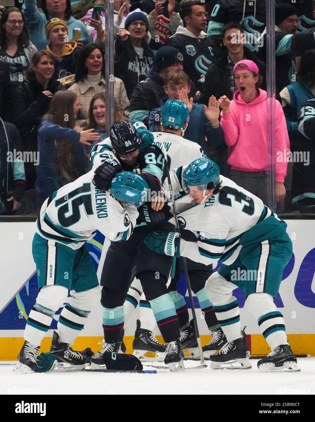 Seattle Kraken right wing Kaapo Kakko (84) fights with San Jose Sharks ...
