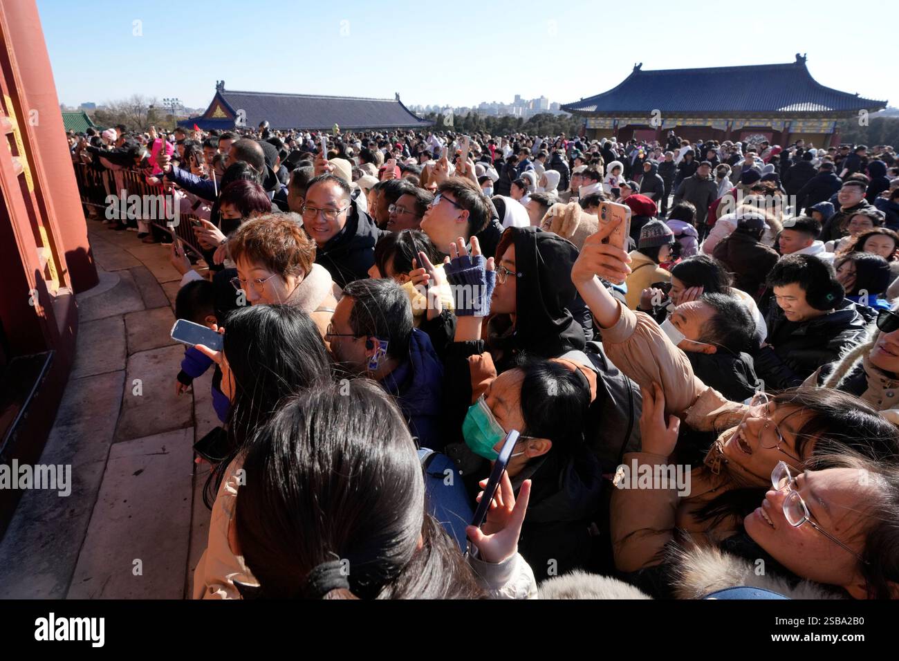 People jostle for position to take pictures of the interiors of the ...