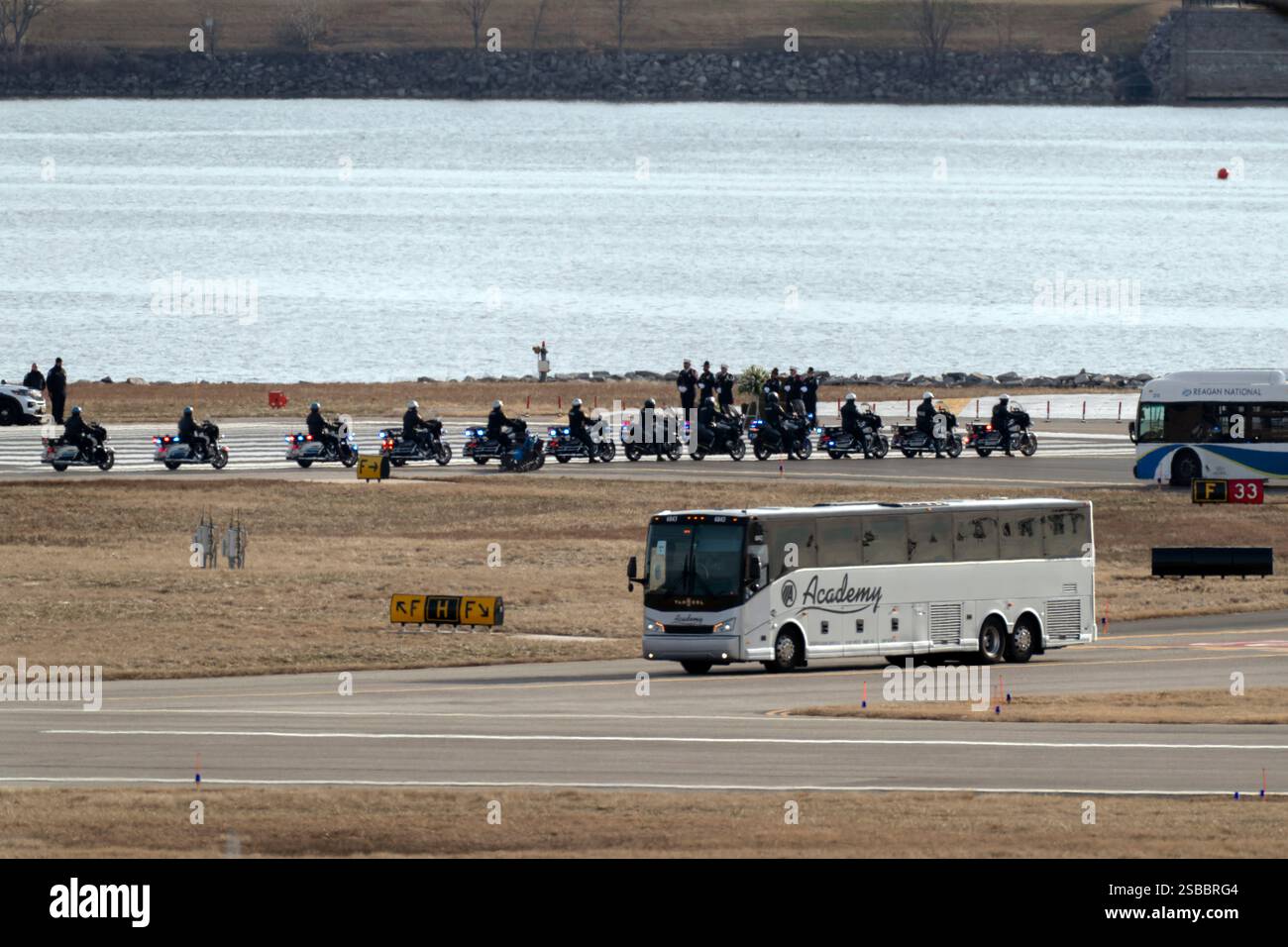 Buses carrying family members of the victims of a mid-air collision ...