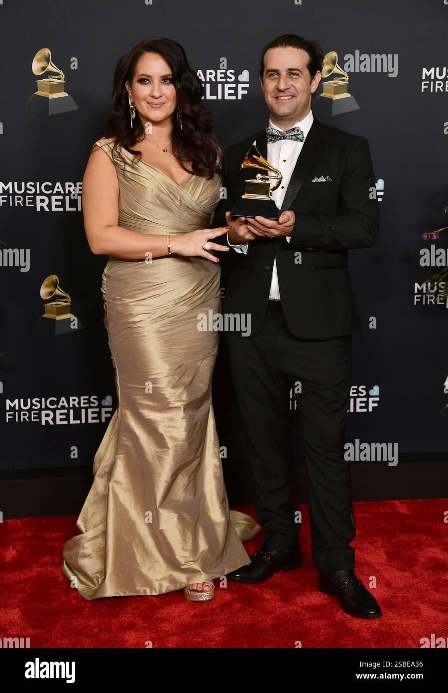 Nicole Zuraitis, left, and Dan Pugach pose in the press room with the ...