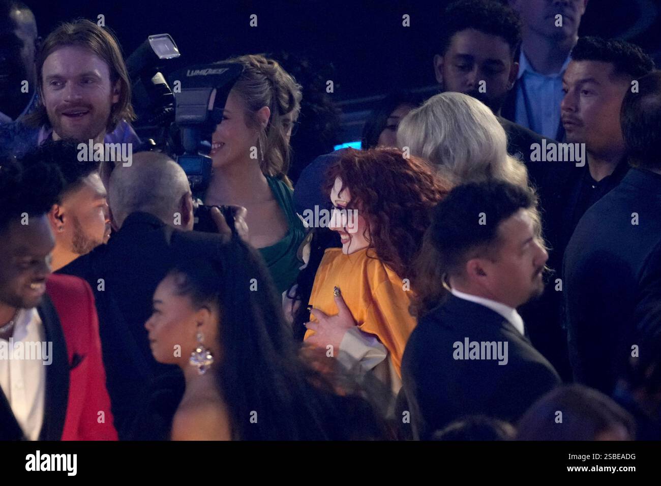 Billie Eilish, left, and Chappell Roan embrace during the 67th annual Grammy Awards on Sunday ...