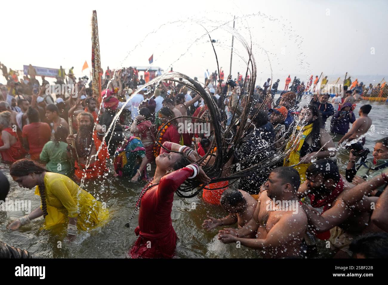 Members of Kinnar Akhara for transgender take dips at Sangam, the ...