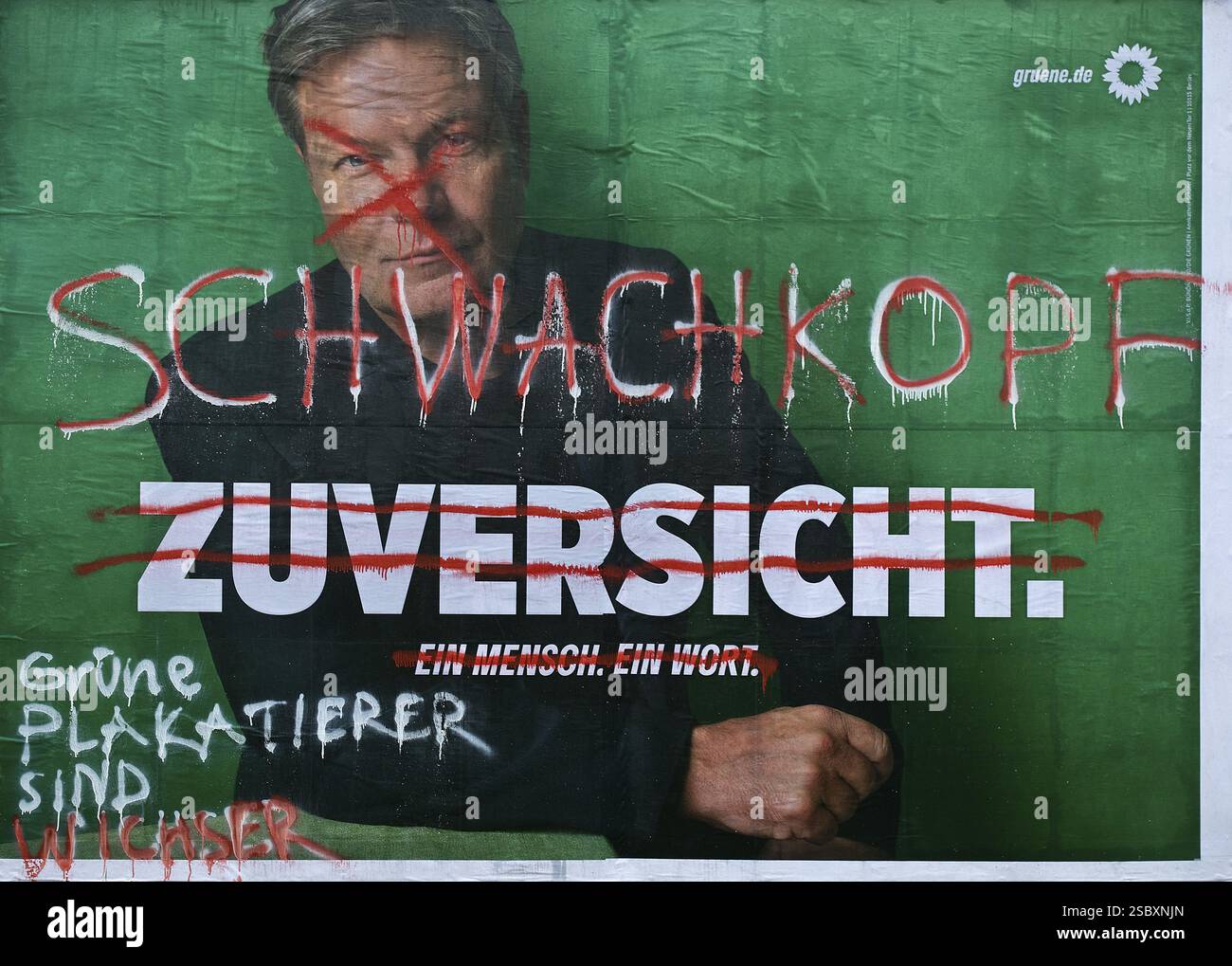 Verunglimpfung eines großen Plakats für die Bundestagswahl 2025 durch ...