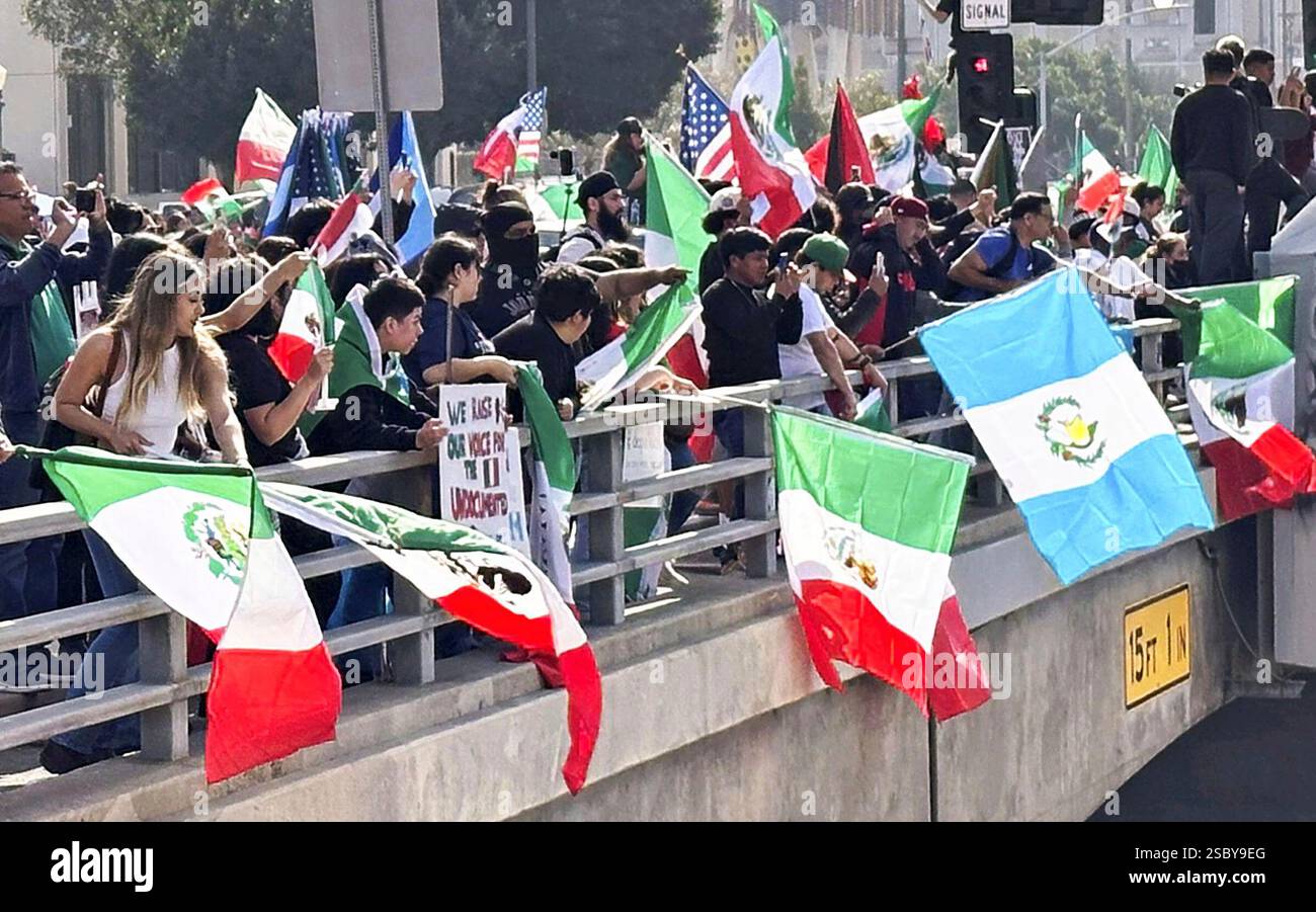 People occupy a road to protest against the Trump administration's ...