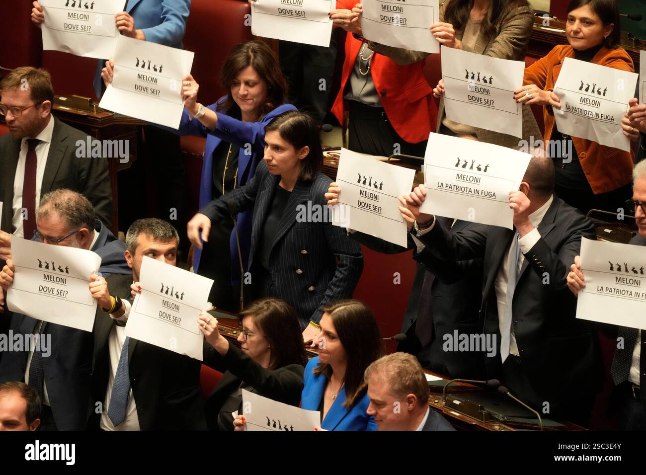 Opposition members of parliament display placards in Italian reading ...