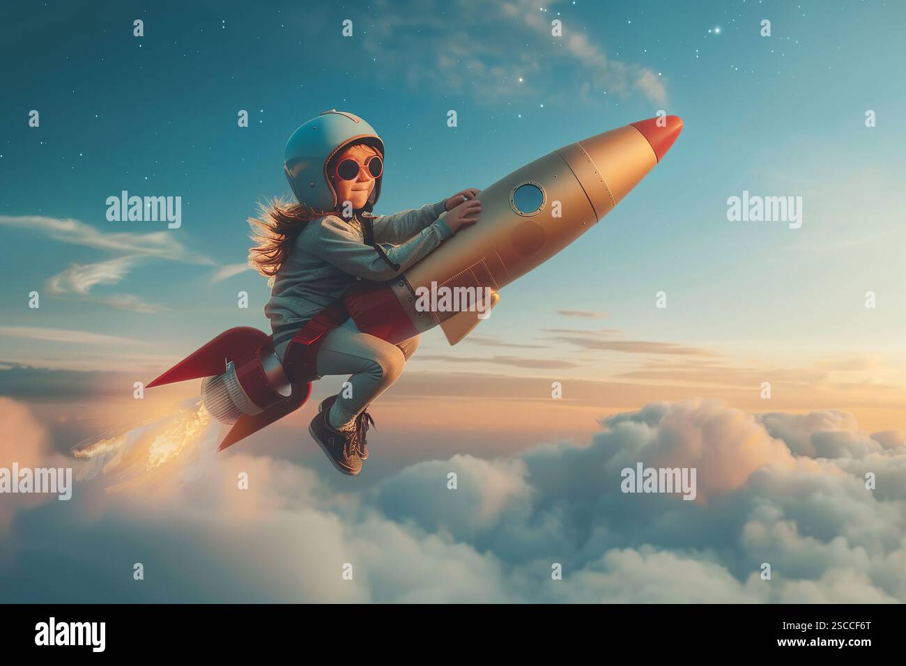 Ein Kind fliegt eine Rakete am Himmel. Das Kind trägt Helm und ...