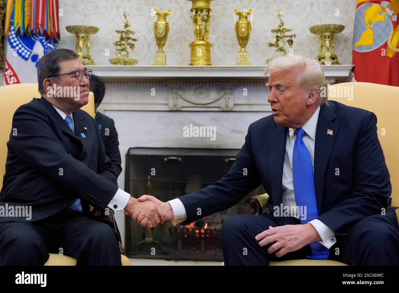 President Donald Trump greets Japanese Prime Minister Shigeru Ishiba in ...