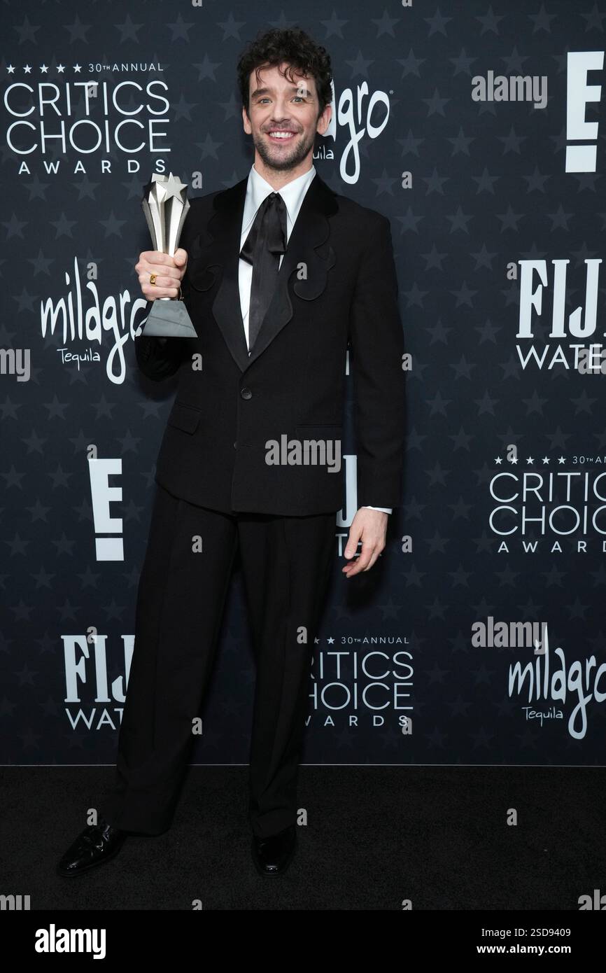Michael Urie poses in the press room with the award for best supporting ...
