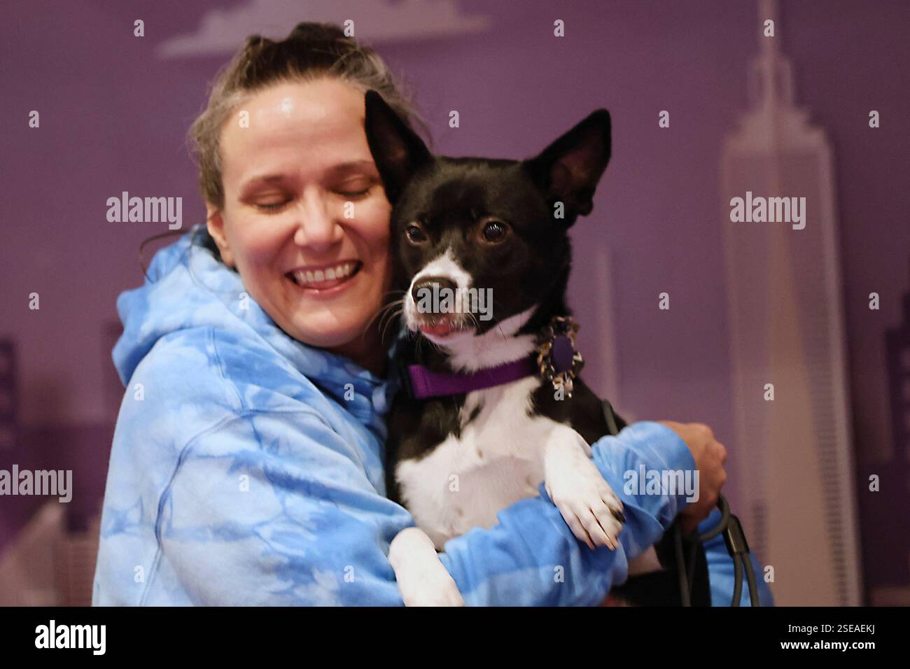 Katrina Wallace poses for a photo with her mixed breed, Beatrice, at ...